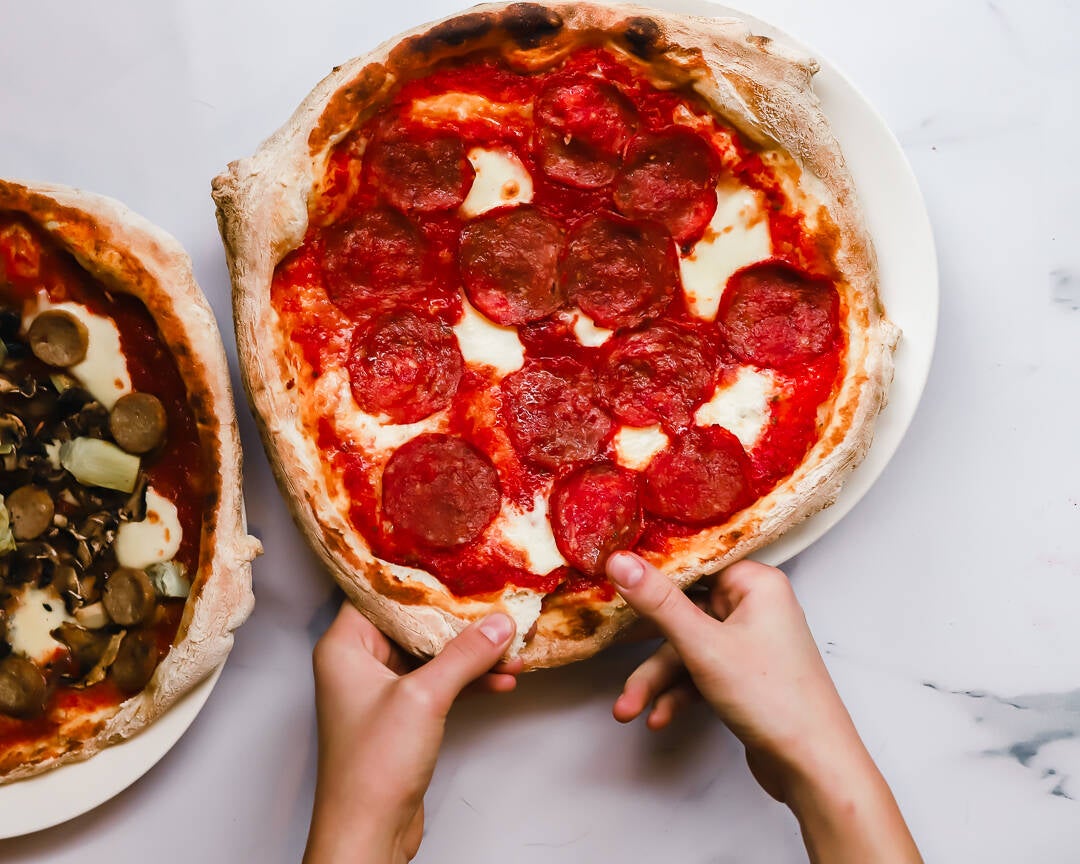 Enjoy authentic Wood-Fired Neapolitan Pizza | Pomodori Pizza